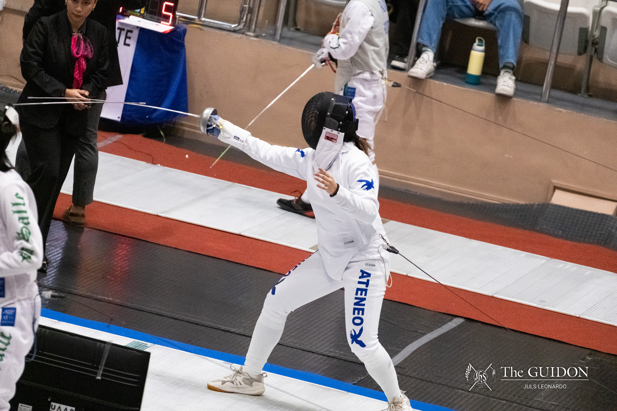 Dela Serna graces the podium on the second day of UAAP Season 88 fencing